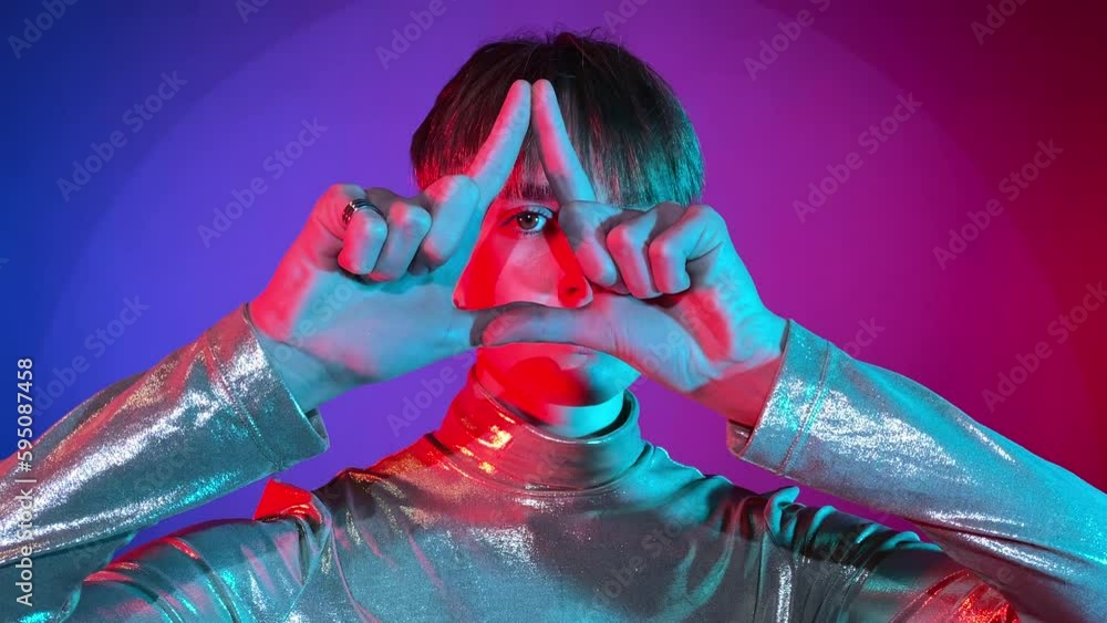 Vídeo do Stock: Portrait young adult woman showing masonic symbol ...