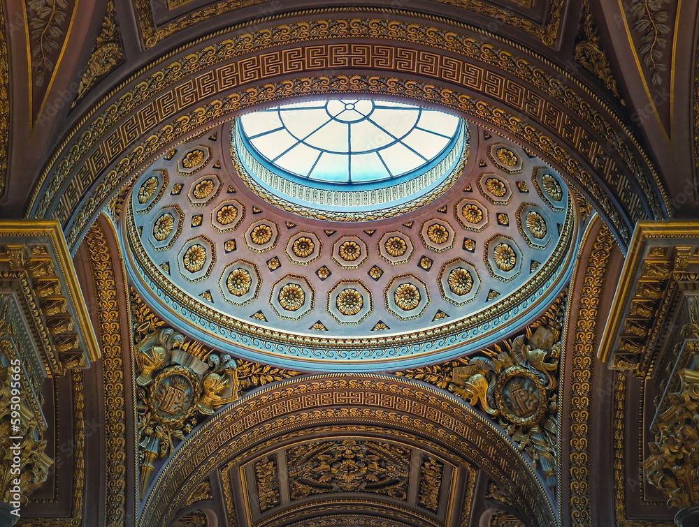 Closeup architectural details of the dome and golden ornate ceiling ...