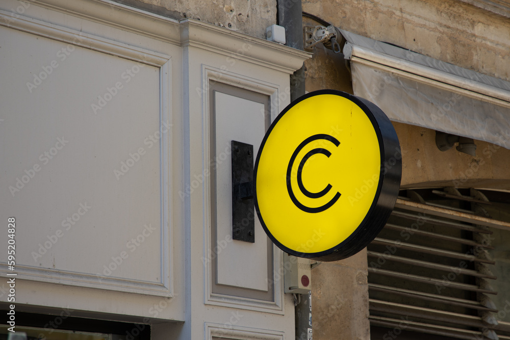 cache cache logo store c text and sign brand facade shop women clothes ...