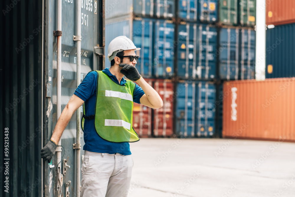 Engineer wear safety uniform check control loading freight cargo ...