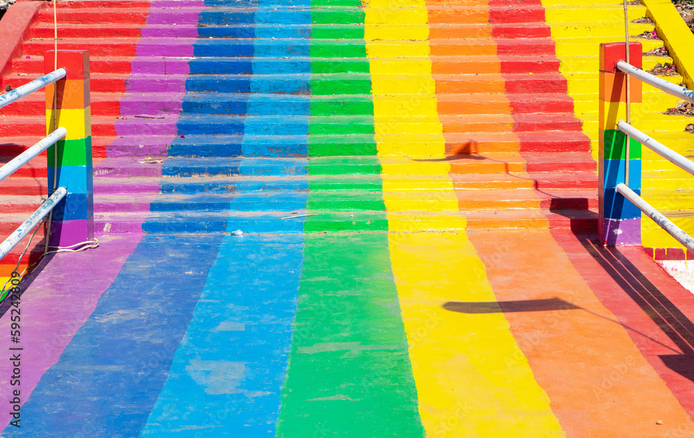 Colorful rainbow stair with canal bridge up from freshwater lake in one ...