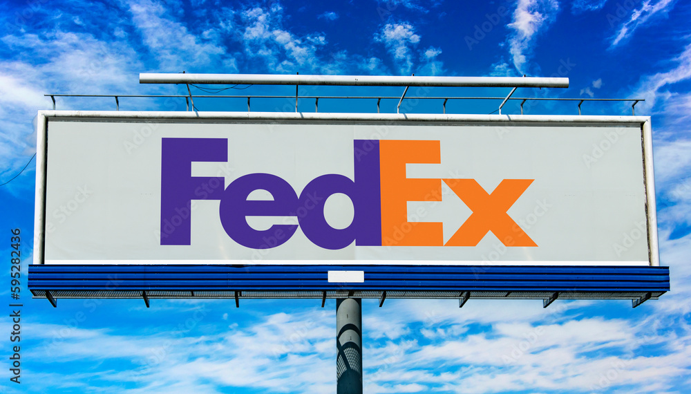 Billboard displaying logo of FedEx Stock Photo | Adobe Stock