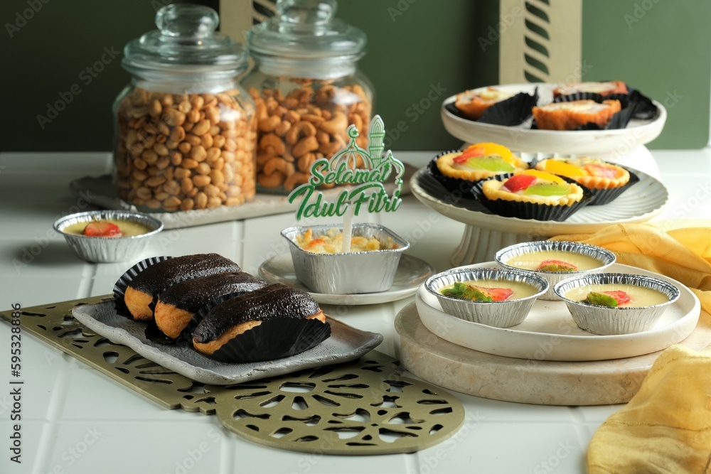 Various of snack for Eid Mubarak, Eid Al Fitr with white and green ...