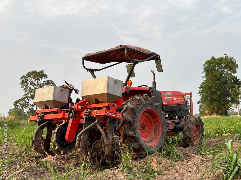 Buriram Thailand, 25 November 2023, Father farmer fertilizing sugar ...