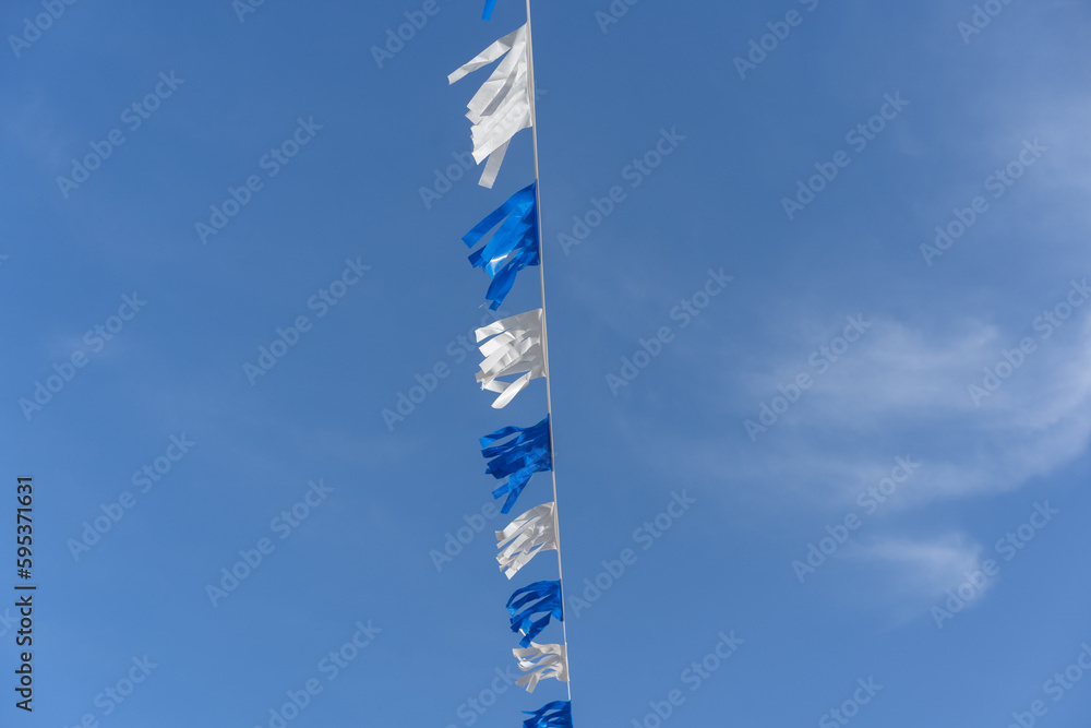 Israeli blue and white flag bunting fluttering against a backdrop of ...