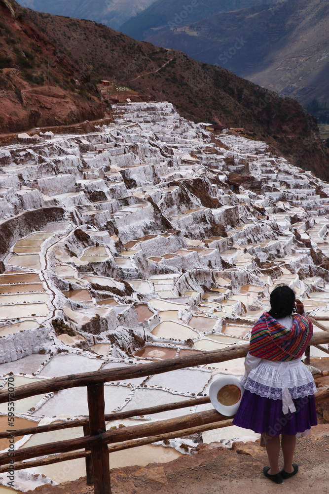 Peruvian girl in the salt flats of Maras- Salinas de Maras Peru ...