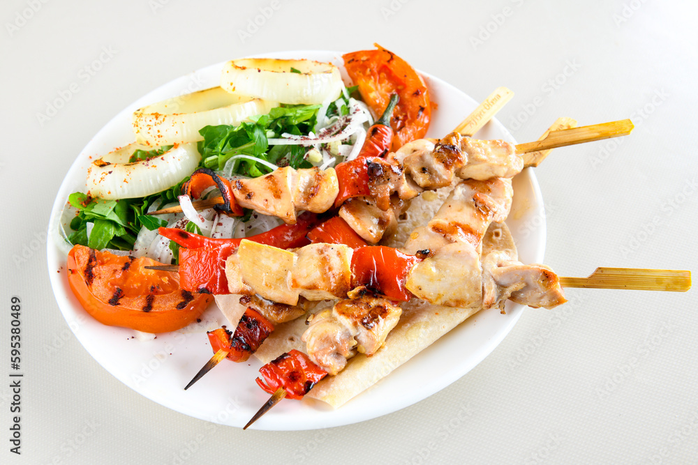 Chicken wings barbeque in a dish with BBQ grill sauce . Izgara tavuk ...