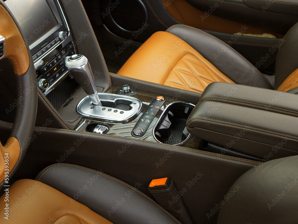 Luxurious modern interior of the car. Automatic transmission lever. Car ...