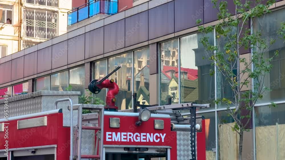 The back of Georgian red fire truck, fire engine on the street. White ...