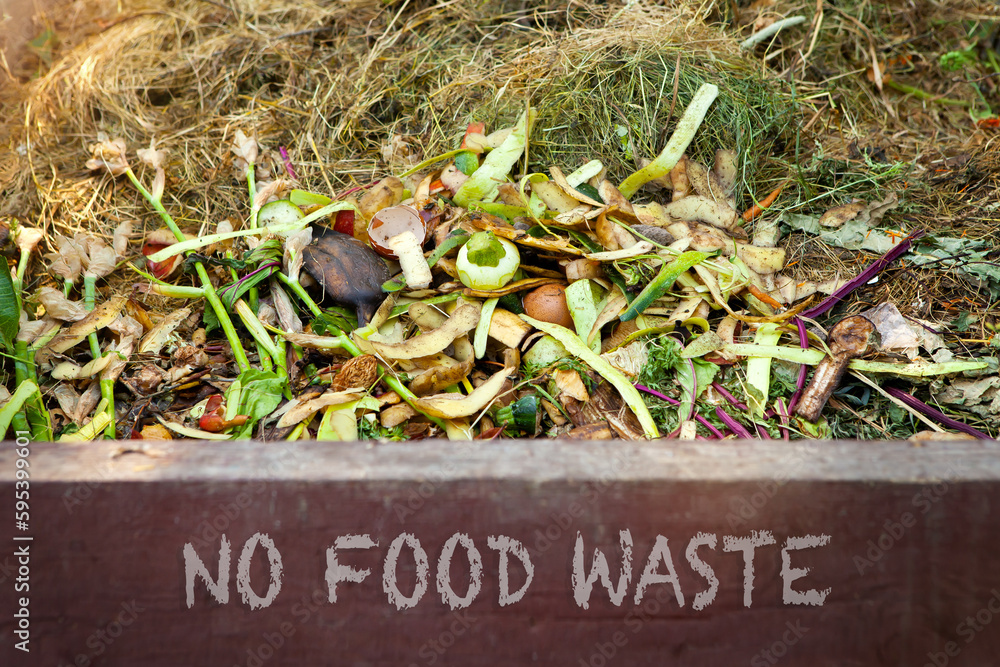 No food waste - text on the front of a compost bin with food scraps and ...