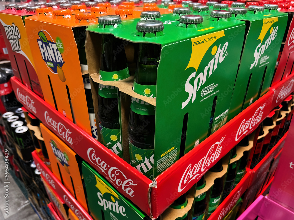 GERMANY - APR 22 2023: Multiple bottles of Coca-Cola Drinks displayed ...