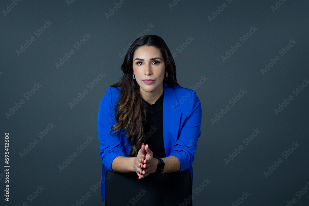 portrait of confident young business woman, concentrated looking at ...