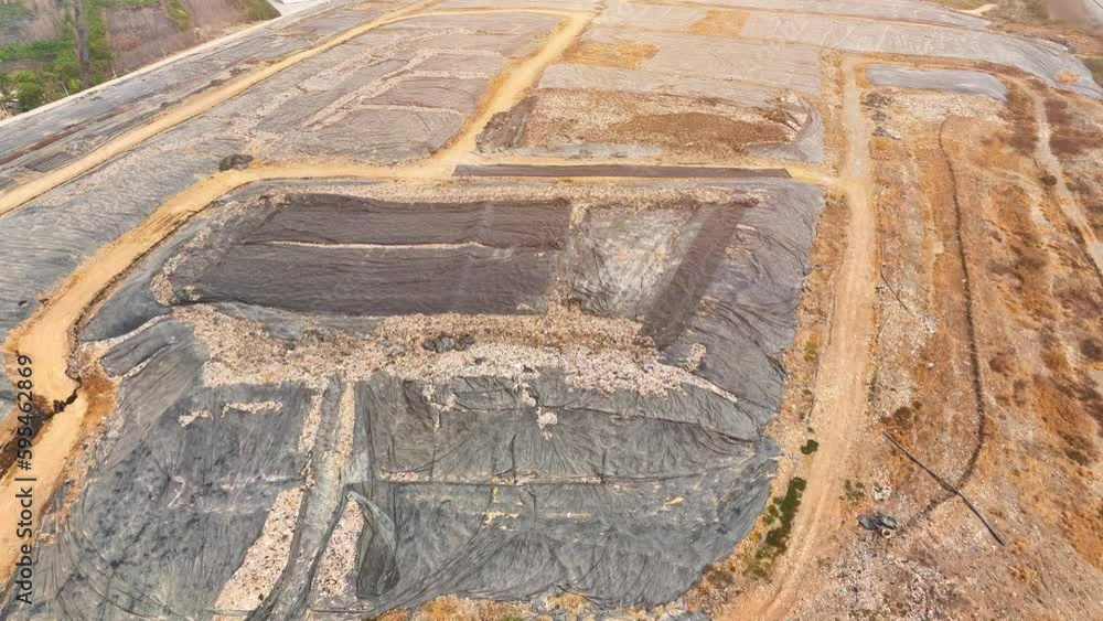 Video Stock A landfill is a site for waste disposal where trash is ...