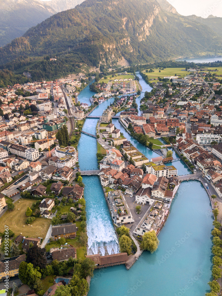 erial view over the city of Interlaken in Switzerland. Interlaken is ...
