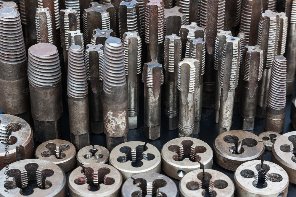 Taps and dies for metal threading. Tools for cutting external and ...