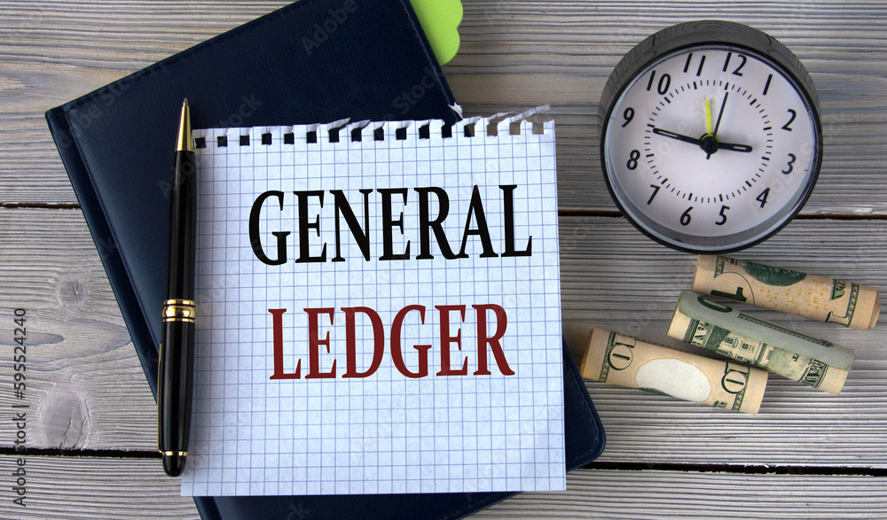 GENERAL LEDGER - words in a white notebook on the background of an ...