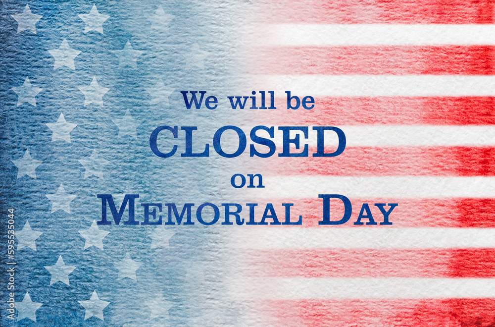 Signboard with the inscription We will be closed on Memorial Day and a ...