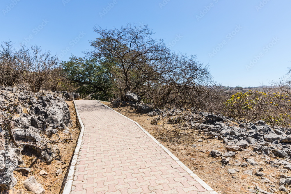 Park near the Tawi Atair Sinkhole Oman, the most famous sinkhole in the ...