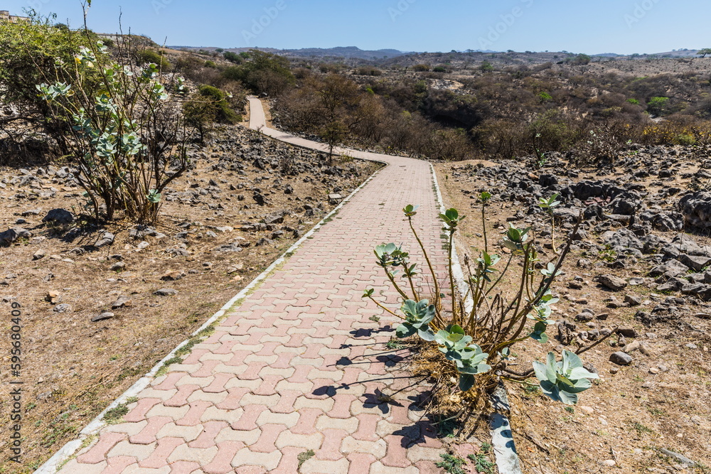 Park near the Tawi Atair Sinkhole Oman, the most famous sinkhole in the ...