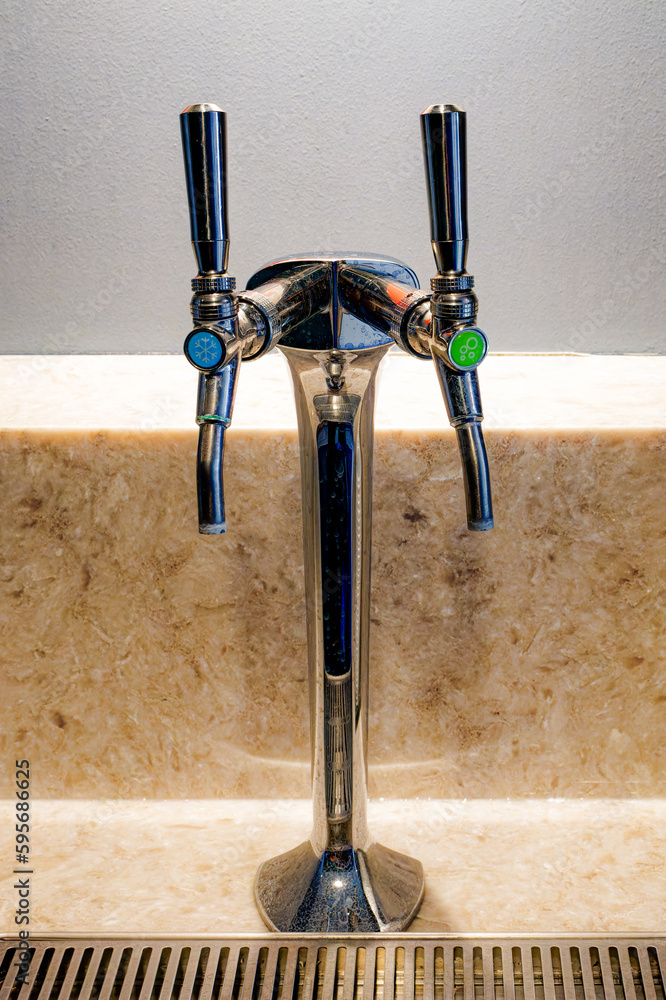 countertop water dispenser with still and sparkling taps Stock Photo ...