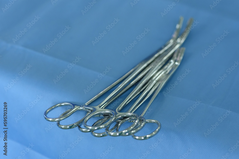 Surgical clamps and medical equipment on the surgical tray. Surgical ...