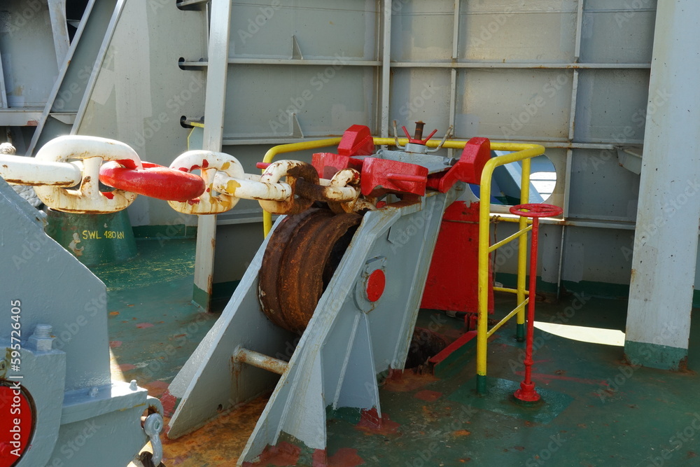 Close view on anchor roller chain stopper for hawse pipe on the forward ...