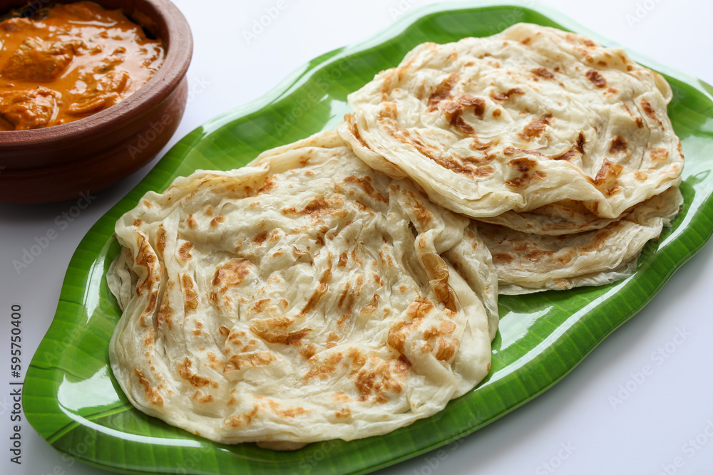 Fish curry with Kerala parathas porotta roti parotta barotta naan ...