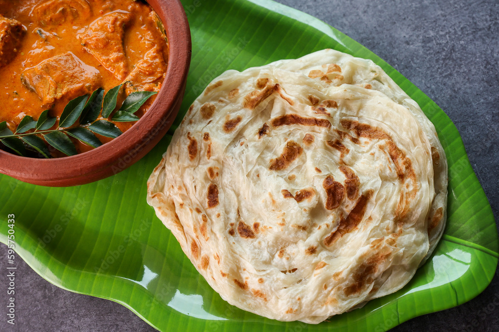 Fish curry with Kerala parathas porotta roti parotta barotta naan ...