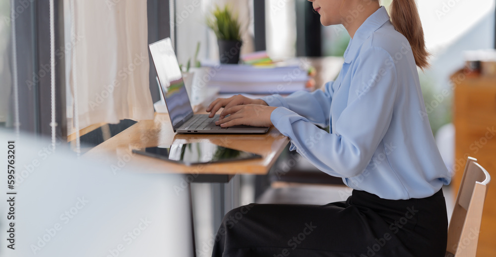 Businesswoman working in the office with paper files Data graph ...