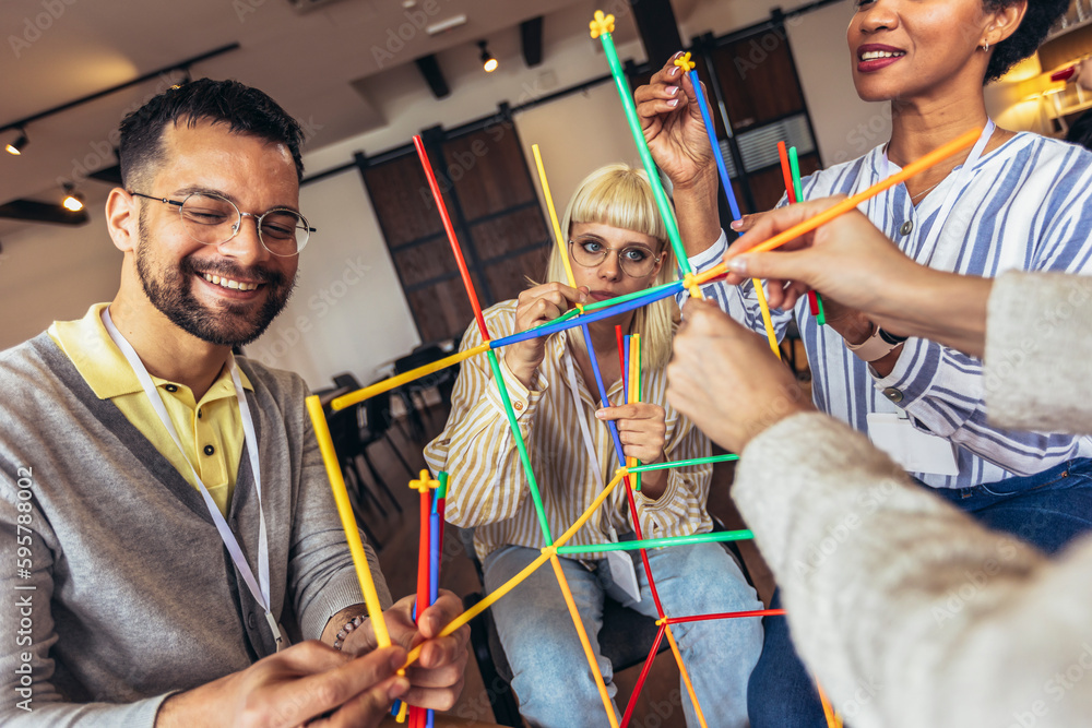 Foto de Team building activities in the office with sticks.Concept of ...