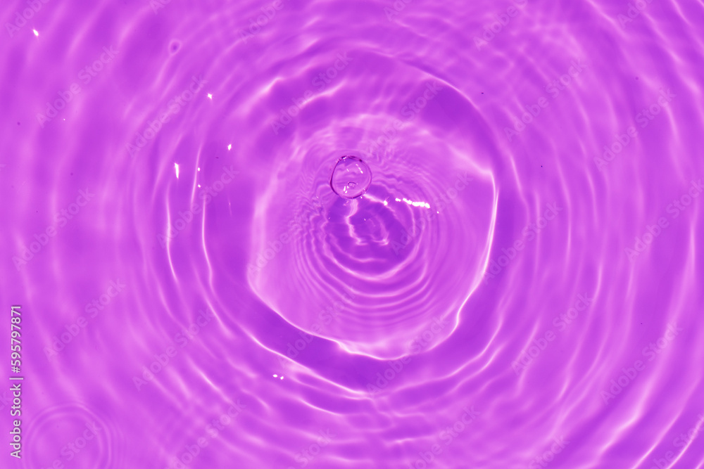 Purple water with ripple on the surface. Defocus blurred transparent ...
