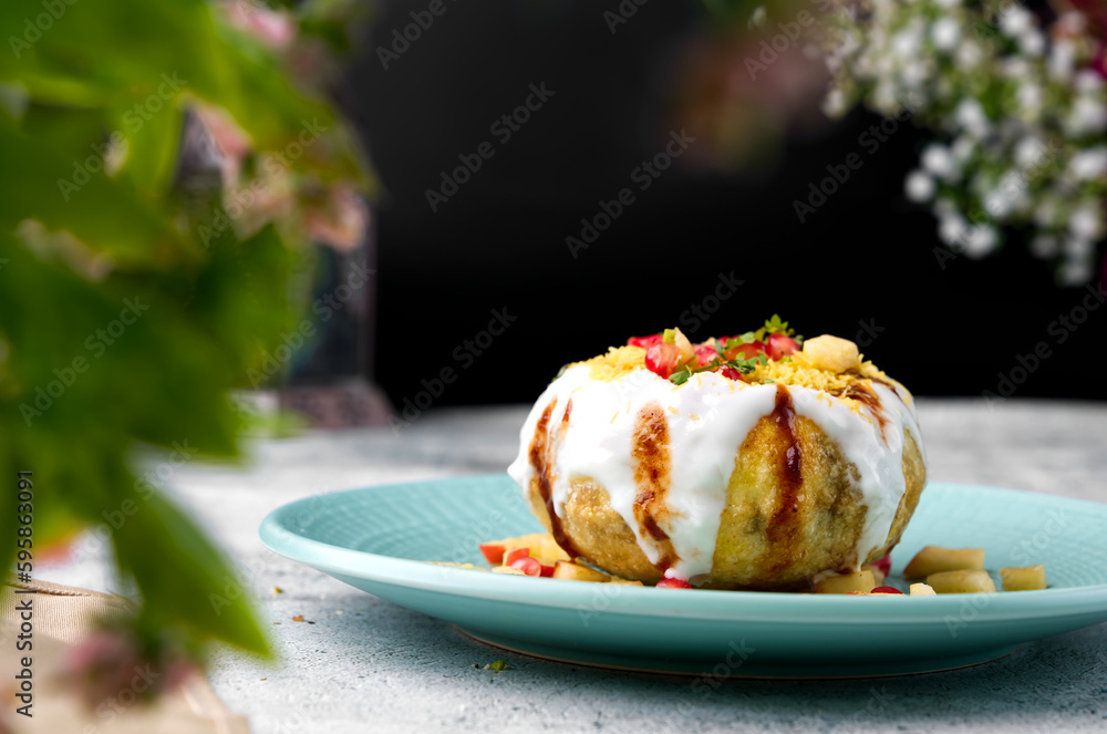 Raj Kachori has crispy fried shells filled with potatoes, yogurt ...