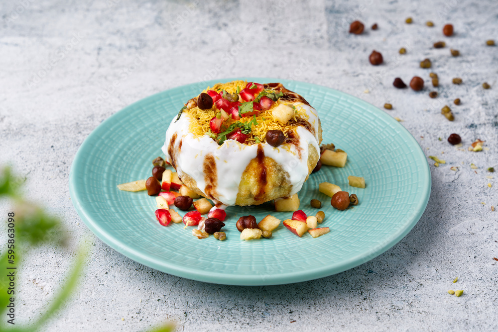 Raj Kachori has crispy fried shells filled with potatoes, yogurt ...