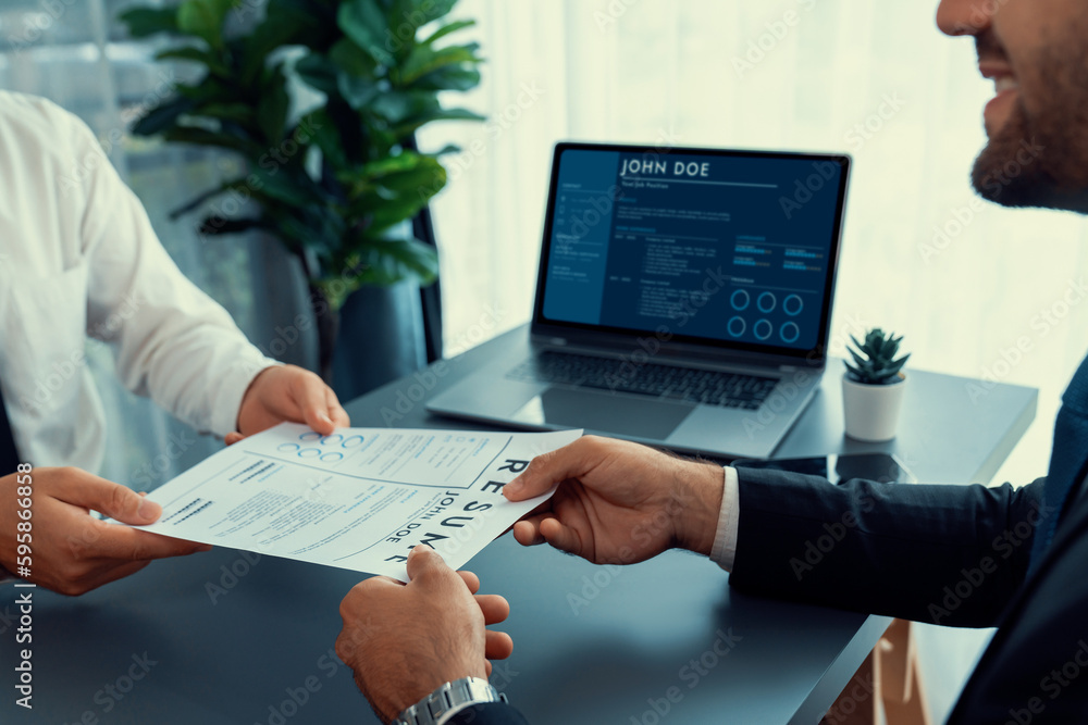 Confident man wearing suit in formal office, hand holding resume paper ...