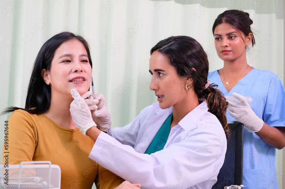 Botox injections on the forehead of a beautiful woman received botox ...