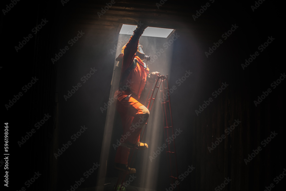 The firefighter is methodical in their approach ensuring safety at ...