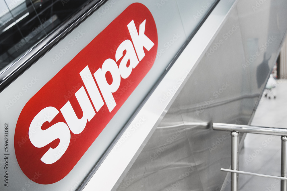 Foto de Logo of a large retailer of Kazakhstan Sulpak on an escalator in a shopping center ...