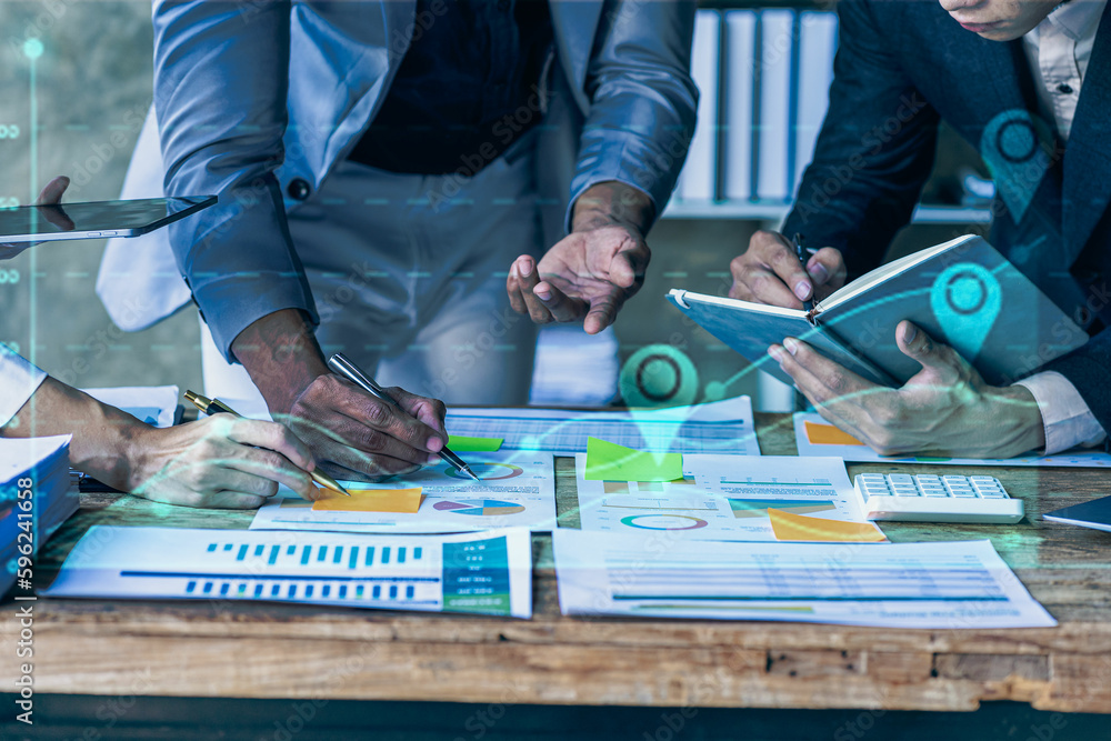 Foto de Business teams review documents, graphs, charts and financial ...