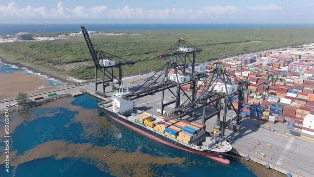 Cargo Ship At Loading Bay Of Container Terminal Of Multimodal Caucedo ...