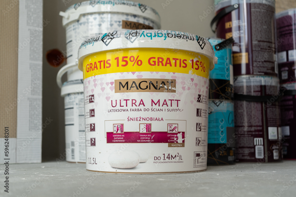 Magnat Ultra Matt white. Bucket with paint in apartment during ...