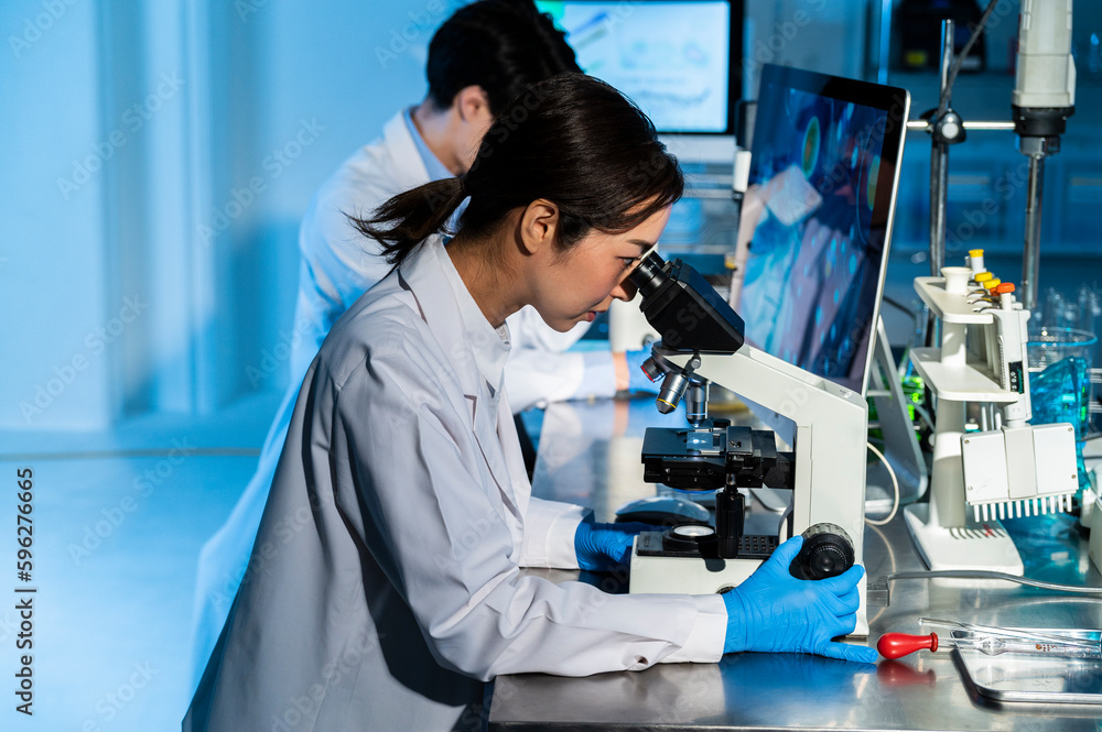 Professional health care researchers working in a medical science ...