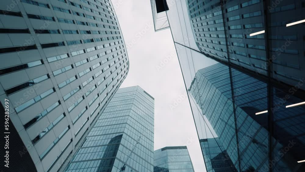 High rise skyscrapers facades low angle dolly effect, financial ...