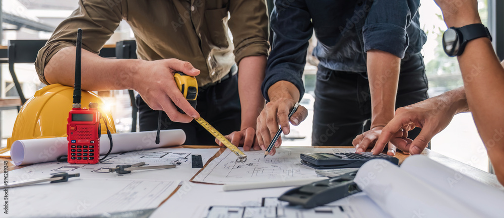 Foto de Civil engineer teams meeting working together wear worker ...