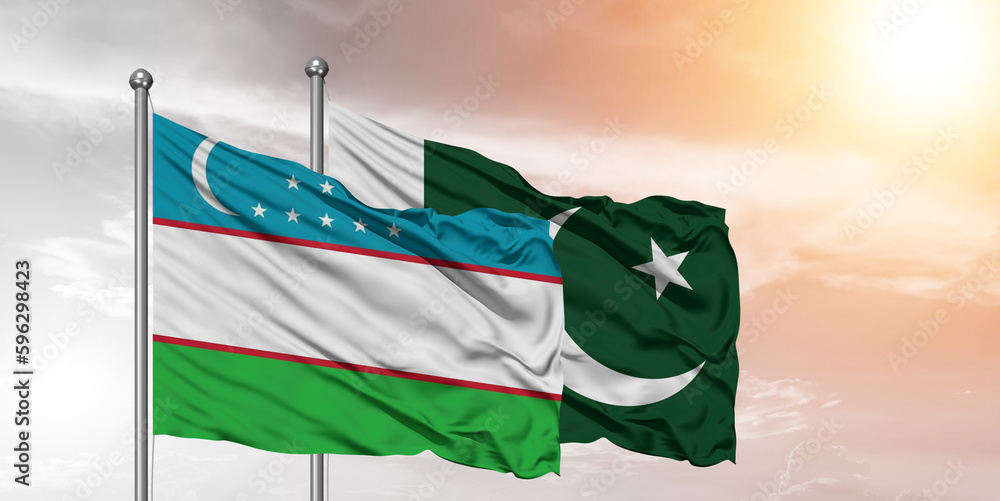 Flags of Pakistan and Uzbekistan friendship flag waving on the sky with ...