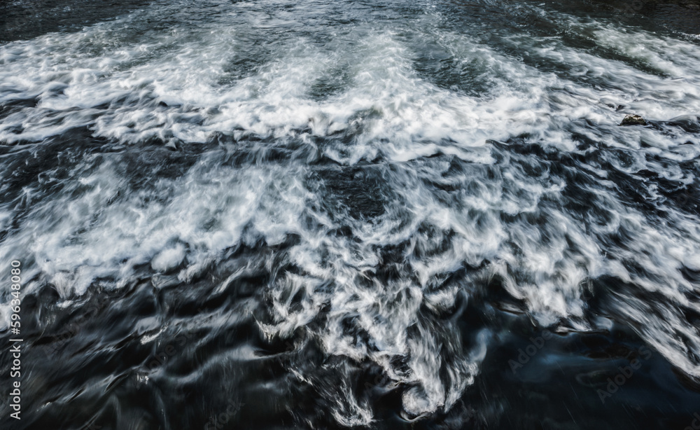 Swelling water in wide trail on surface Stock Photo | Adobe Stock