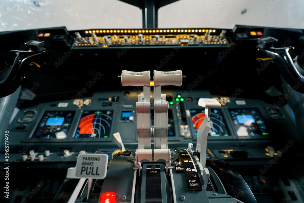 Poster thrust lever in the cockpit of an airplane a close-up view of a ...