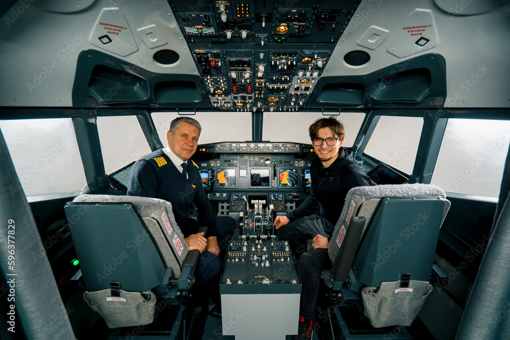airplane cockpit pilot and young student boy smiling after training on ...