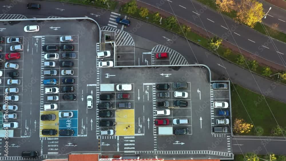 Video „Aerial view of large car parking with many parked cars. Car park ...
