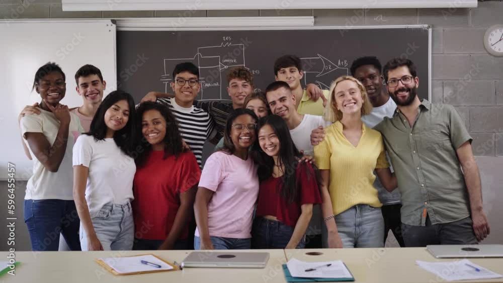 Portrait of large group of happy students looking at camera posing for ...