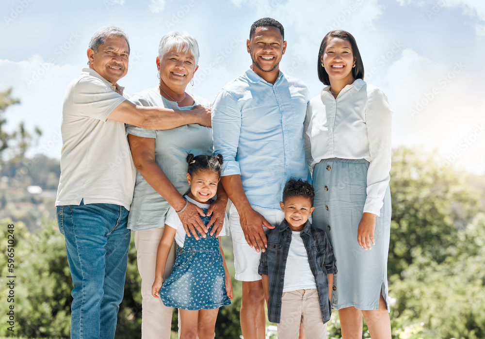 Im so proud of my family. Shot of a multi-generational family standing ...